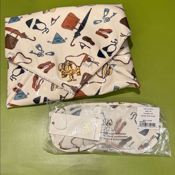 Tory Burch | Bags | Tory Burch Cream Pouch With Gold Logo | Poshmark
